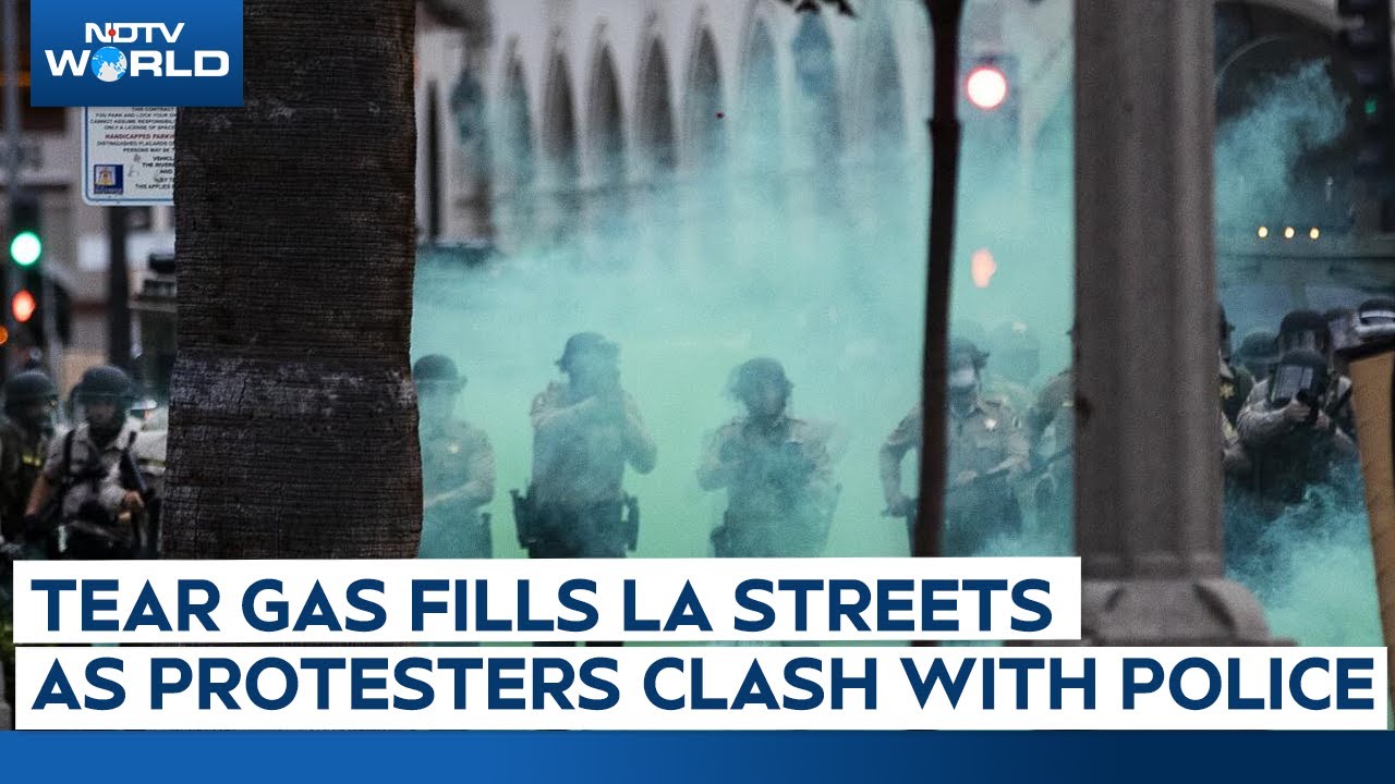 Tear Gas Fills LA Streets, Protesters Clash With Police Following ICE Raids