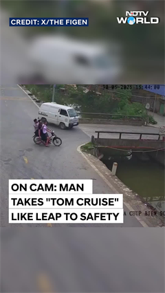 On Cam: Man Takes "Tom Cruise" Like Leap To Safety