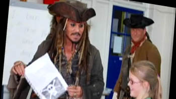 Johnny Depp visits budding pirates at a UK school