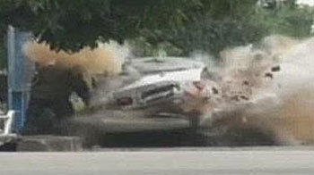 Caught on camera: Car explodes as bomb squad officer tries to enter