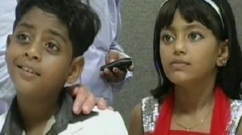 Slumdog kids skip school, may lose cash